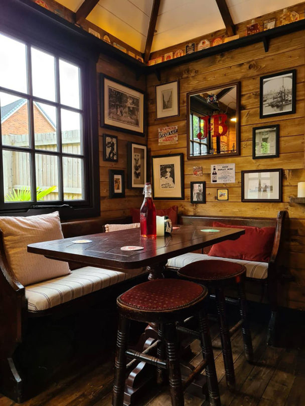 Couple builds stunning mini garden pub with handmade interior