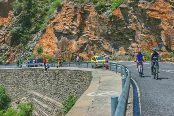 Video shows Father dangling his son over the edge of a cliff