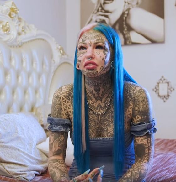 'Dragon girl' spends $120k on body modifications - 'I hated the old ...